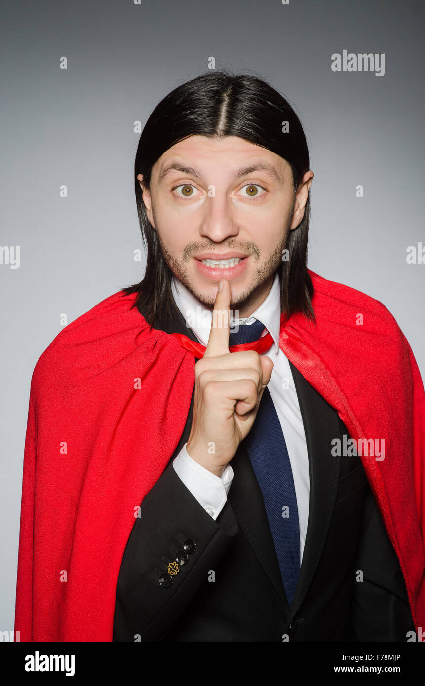 Man wearing red clothing in funny concept Stock Photo - Alamy