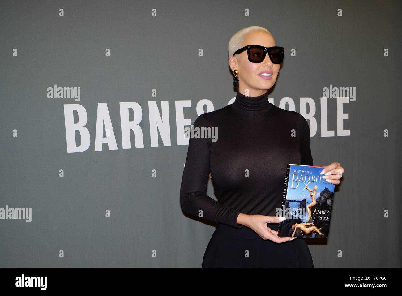 Music artist Amber Rose signs copies of her book 'How To Be A Bad Bitch ...