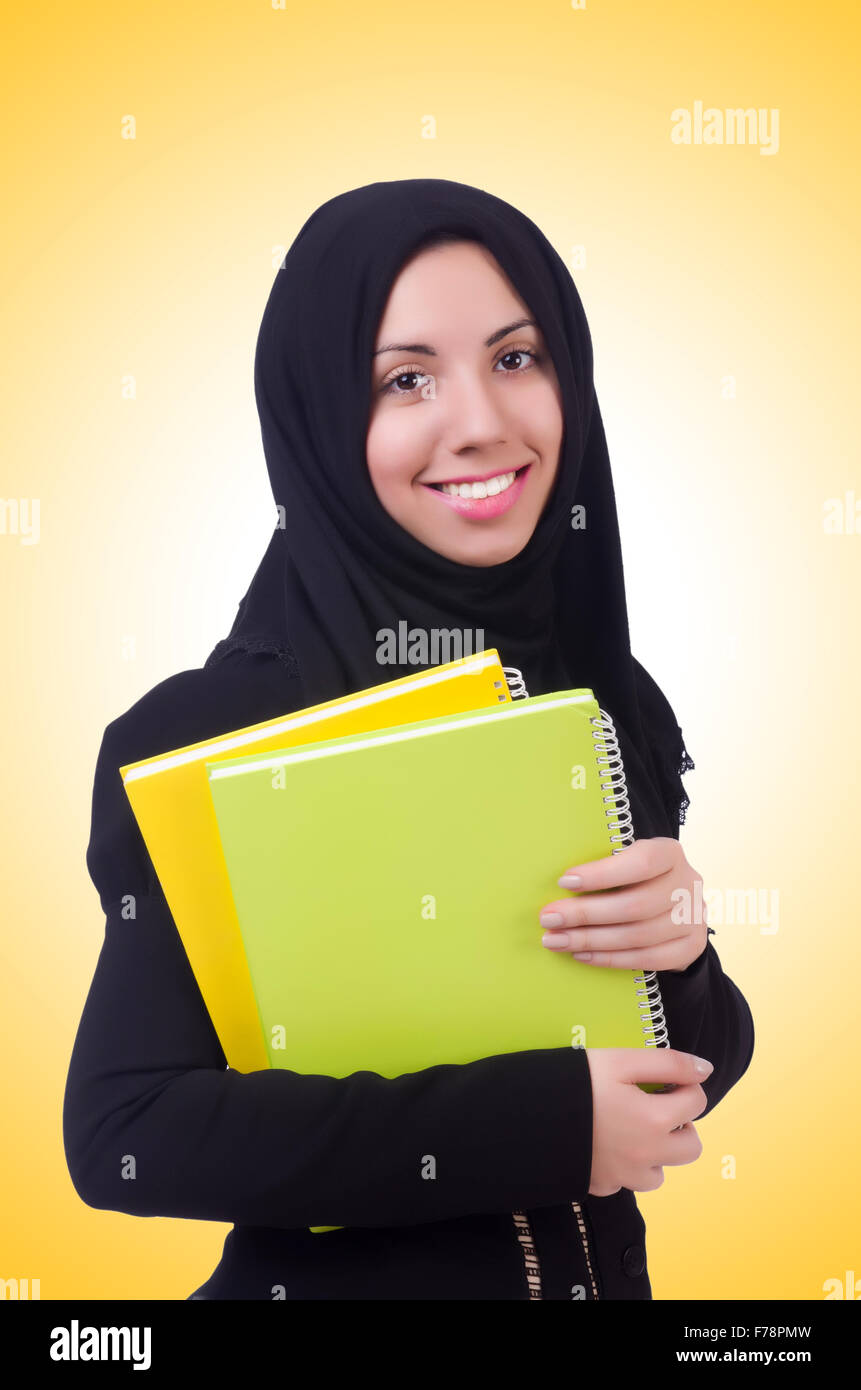 Young muslim female student with books Stock Photo - Alamy