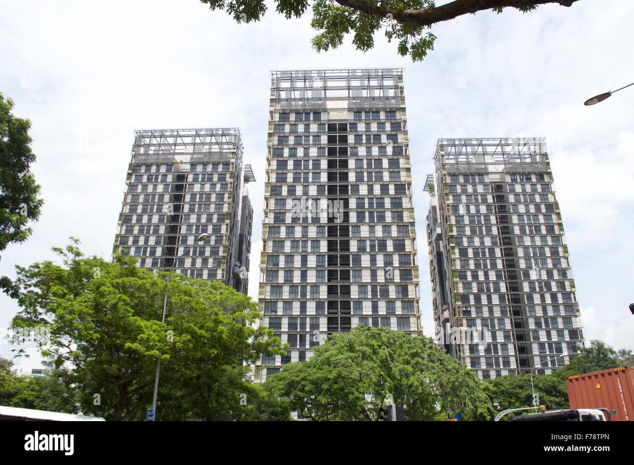 Green modern building in Singapore with modern construction and complex ...