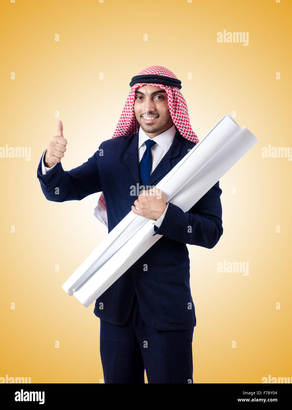 Arab engineer with drawings against gradient Stock Photo - Alamy