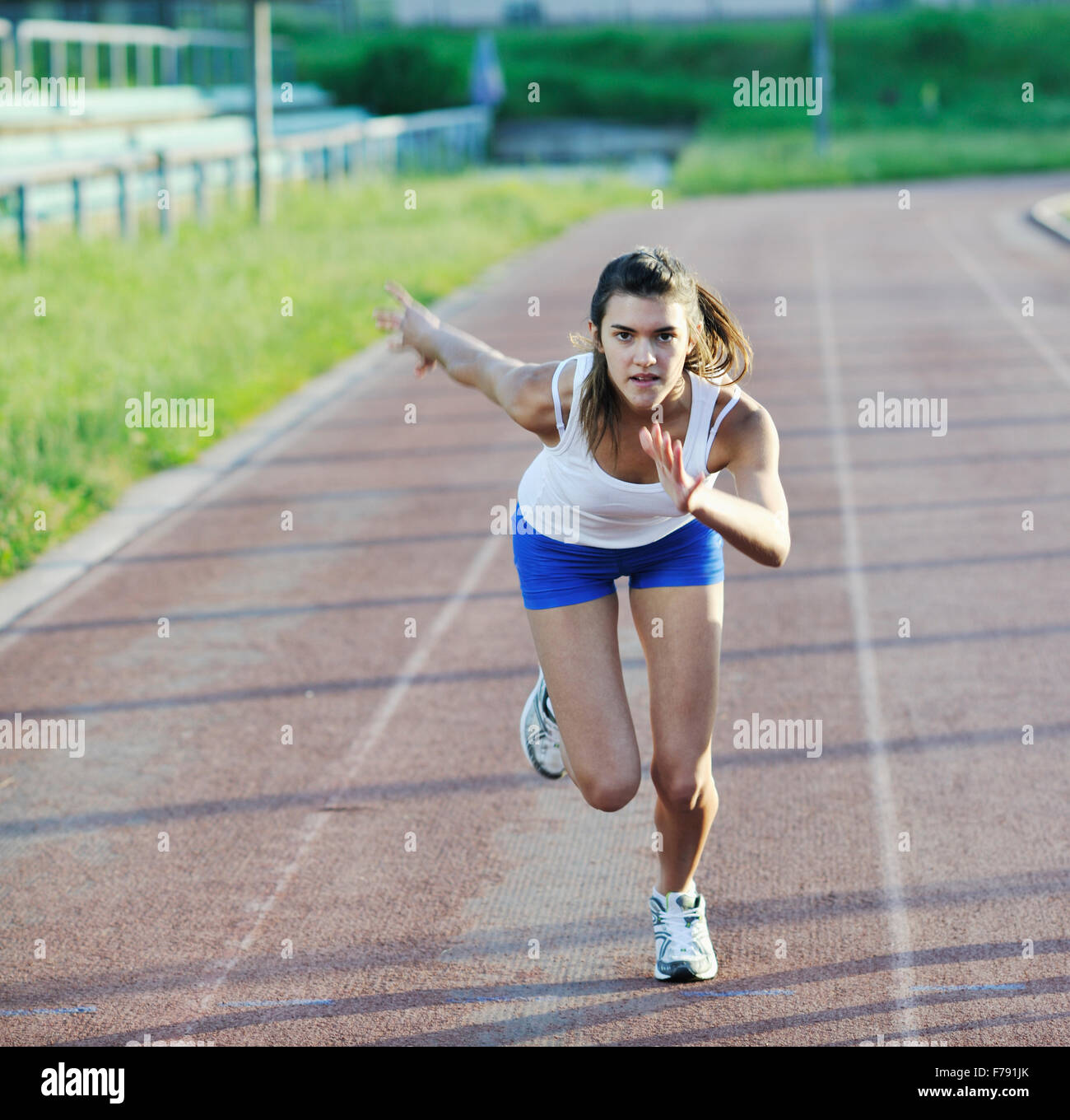 Female athlete running on runing track hi-res stock photography and ...