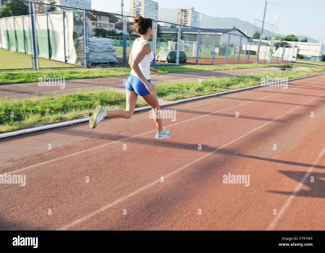 Female athlete running on runing track hi-res stock photography and ...