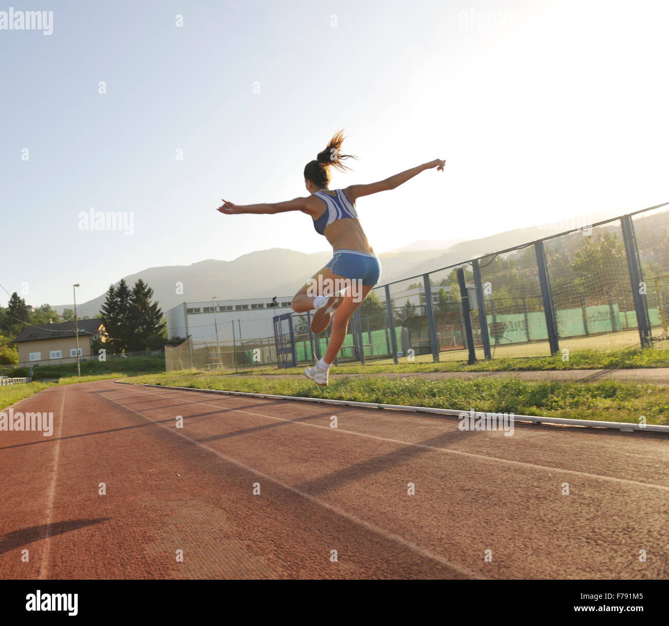 Female athlete running on runing track hi-res stock photography and ...
