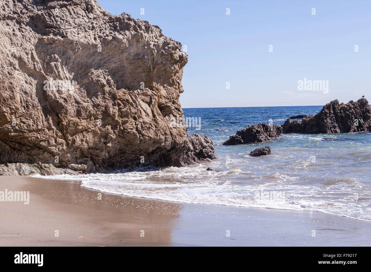 Rock formations on the beach in Malibu, California Stock Photo - Alamy