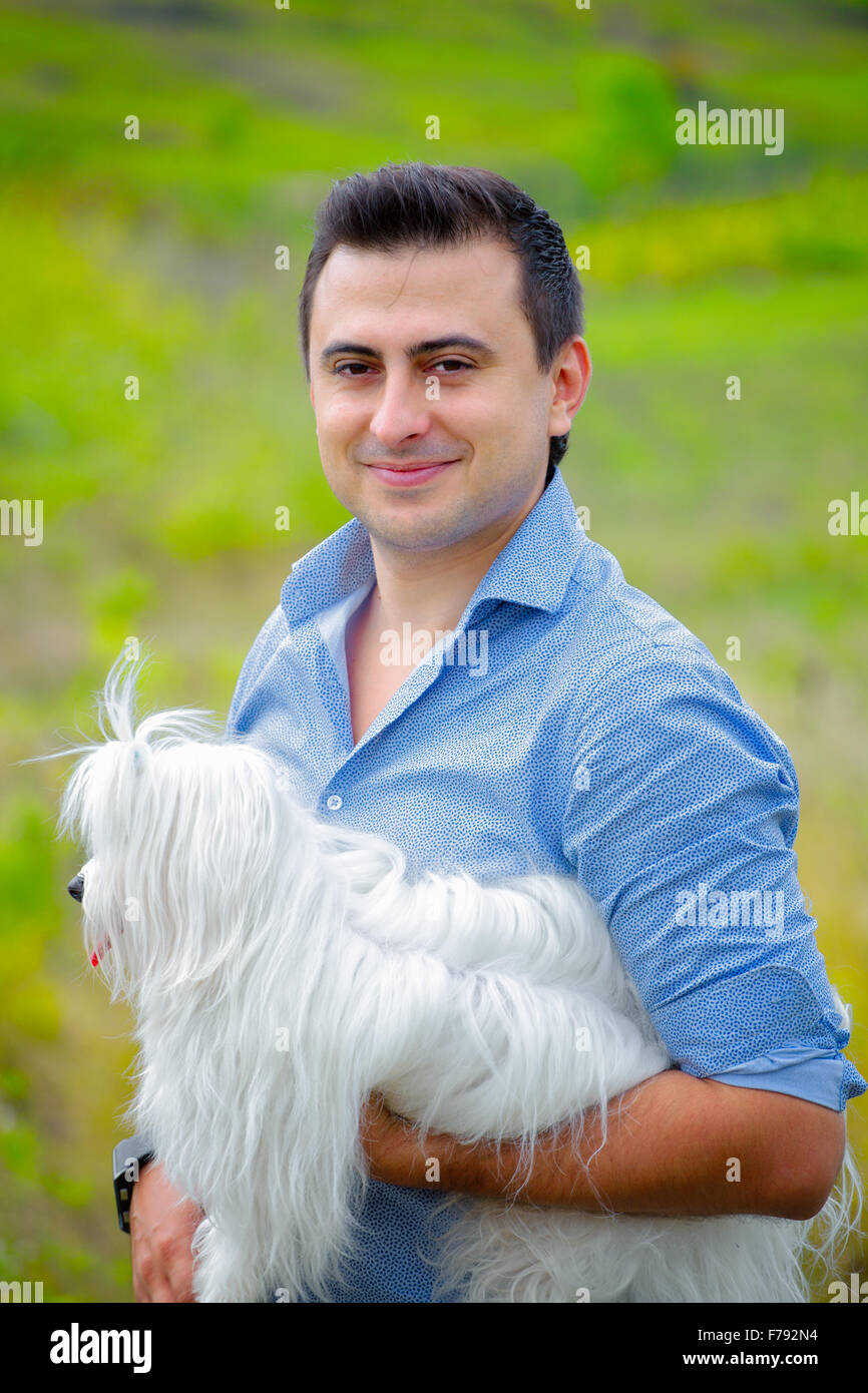 Portrait of man with his dog outdoor in nature Stock Photo - Alamy