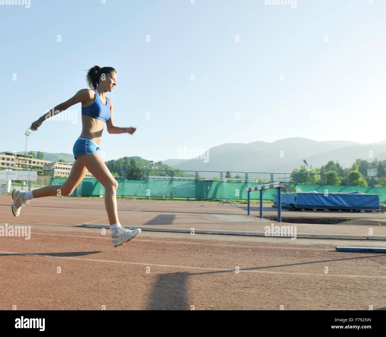 Female athlete running on runing track hi-res stock photography and ...
