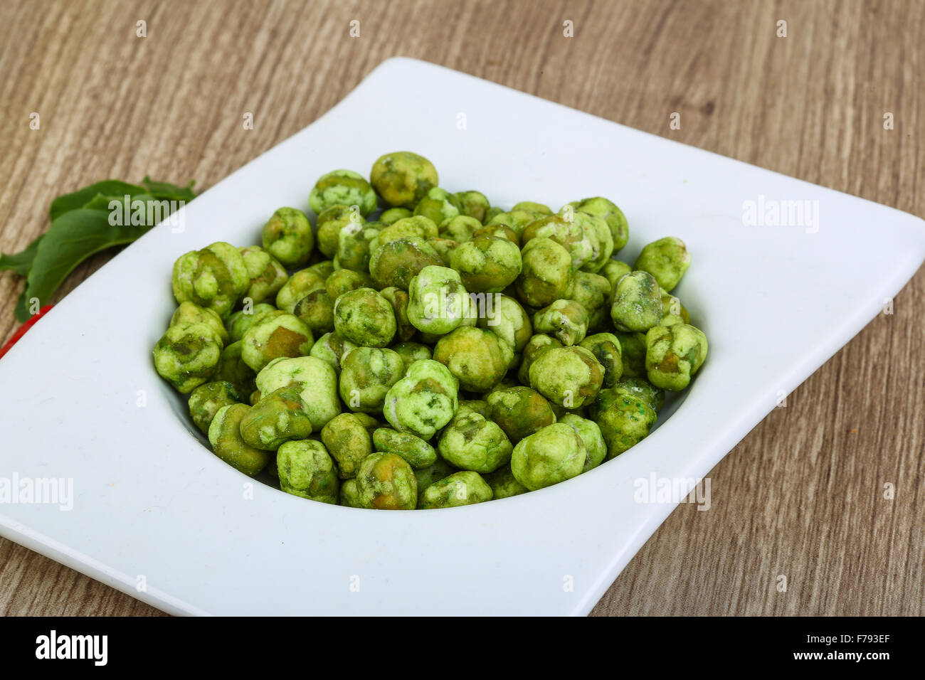 Japan traditional cuisime - Wasabi peas on the wood background Stock ...
