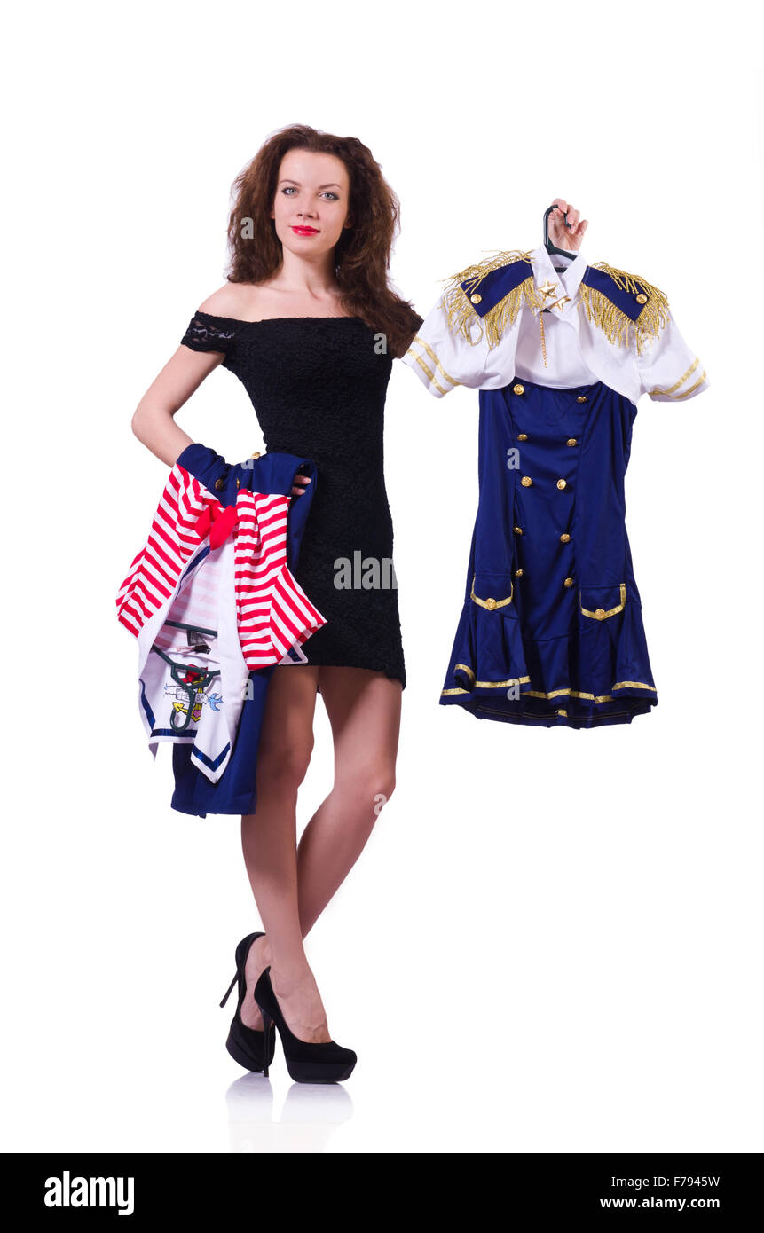 Woman trying to choose dress on white Stock Photo - Alamy