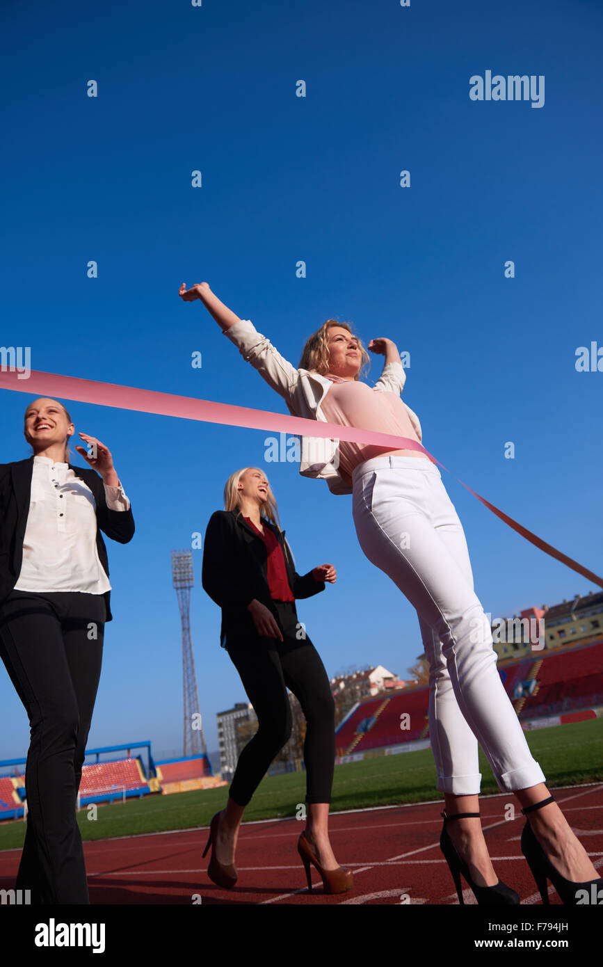 business people running together on racing track Stock Photo - Alamy