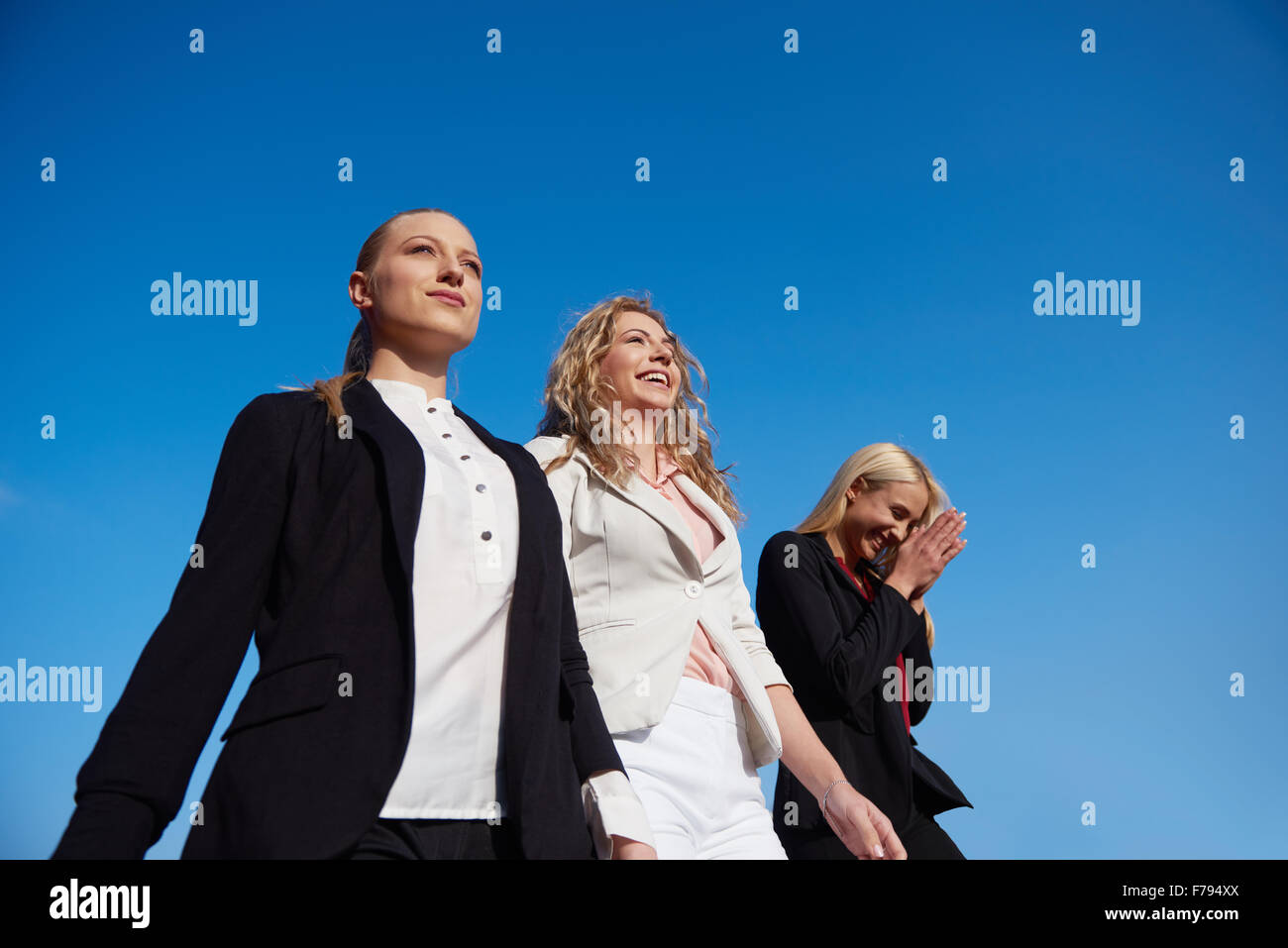 business people running together on athletics racing track Stock Photo ...