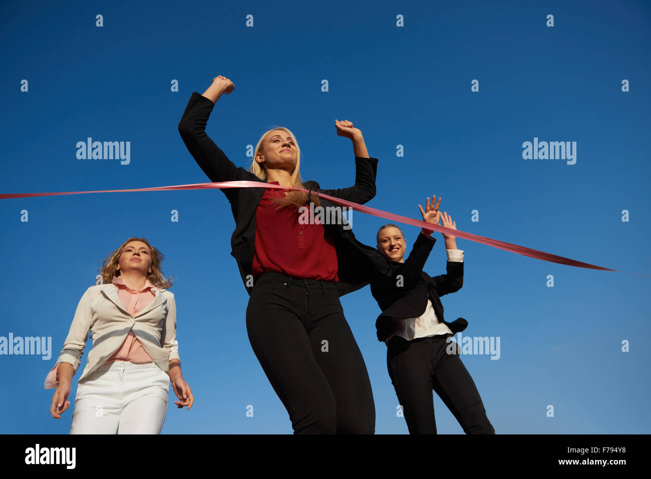 business people running together on racing track Stock Photo - Alamy
