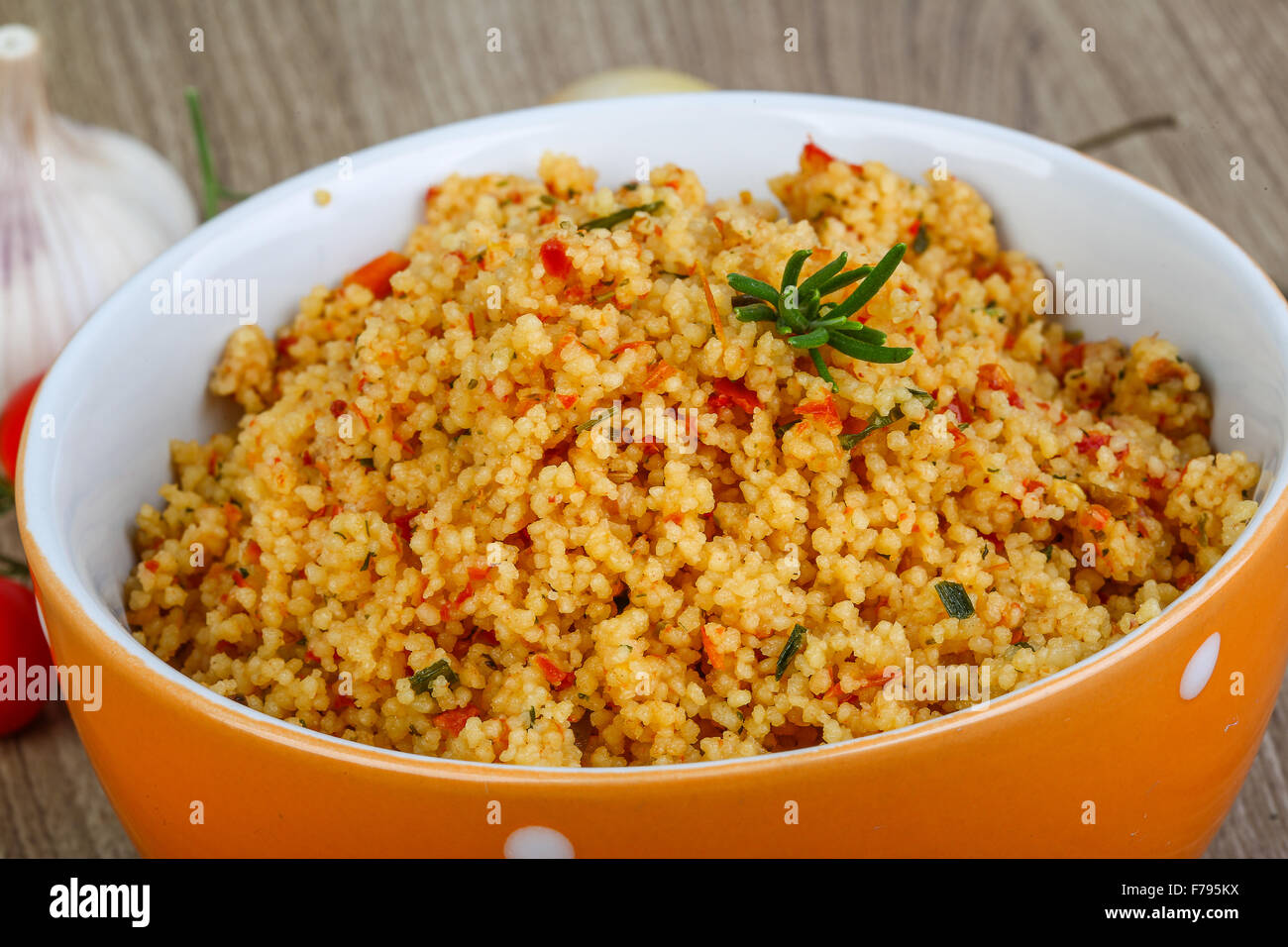 Arabic traditional cuisine - Couscous with tomato and green onion Stock ...