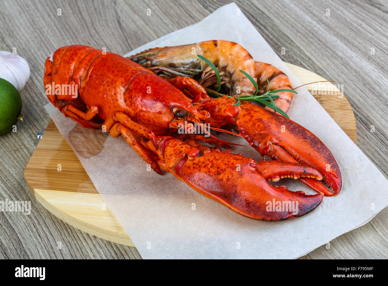 Big cooked lobster and tiger shrimps ready for eating Stock Photo - Alamy