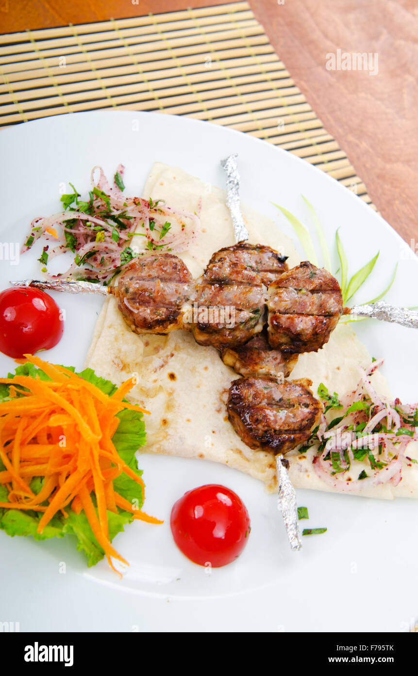 Meat cuisine - kebab served in plate Stock Photo - Alamy