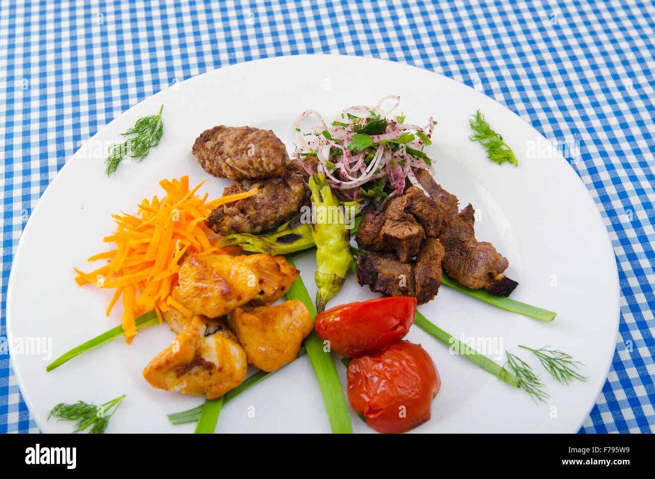 Plate with tasty lamp kebabs Stock Photo - Alamy