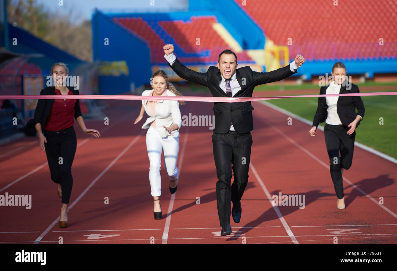 business people running together on athletics racing track Stock Photo ...