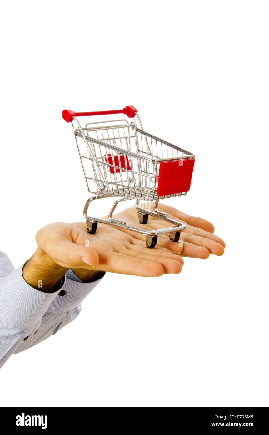 Hand holding shopping cart on white Stock Photo - Alamy