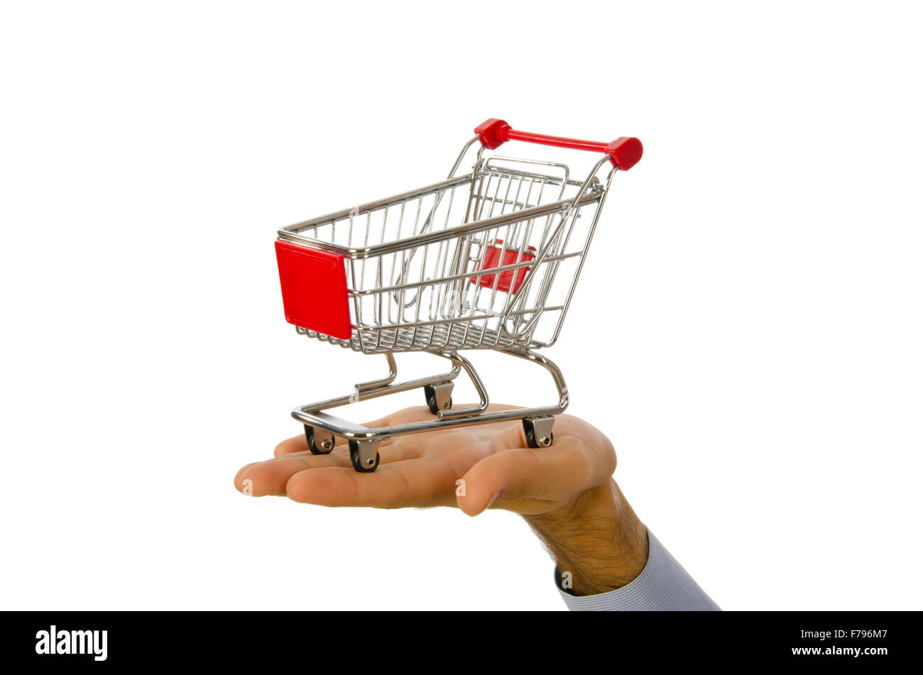 Hand holding shopping cart on white Stock Photo - Alamy