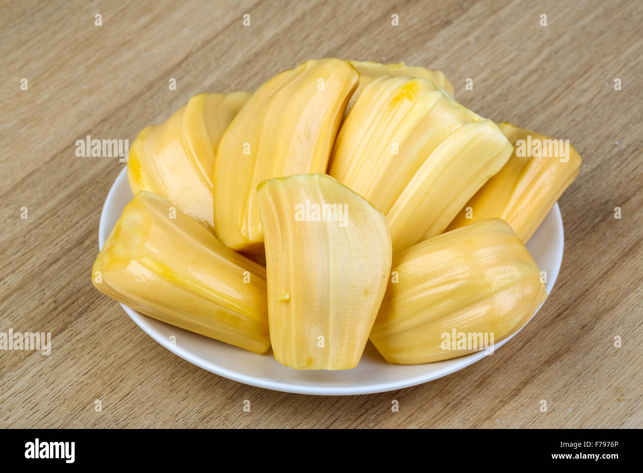 Tropical Jack Fruit on the wood background Stock Photo - Alamy