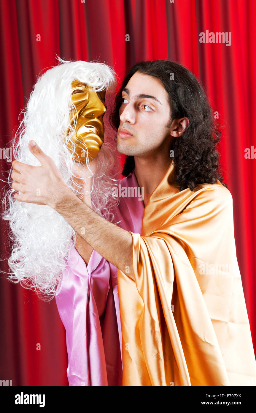 Theater concept with masked actor Stock Photo - Alamy