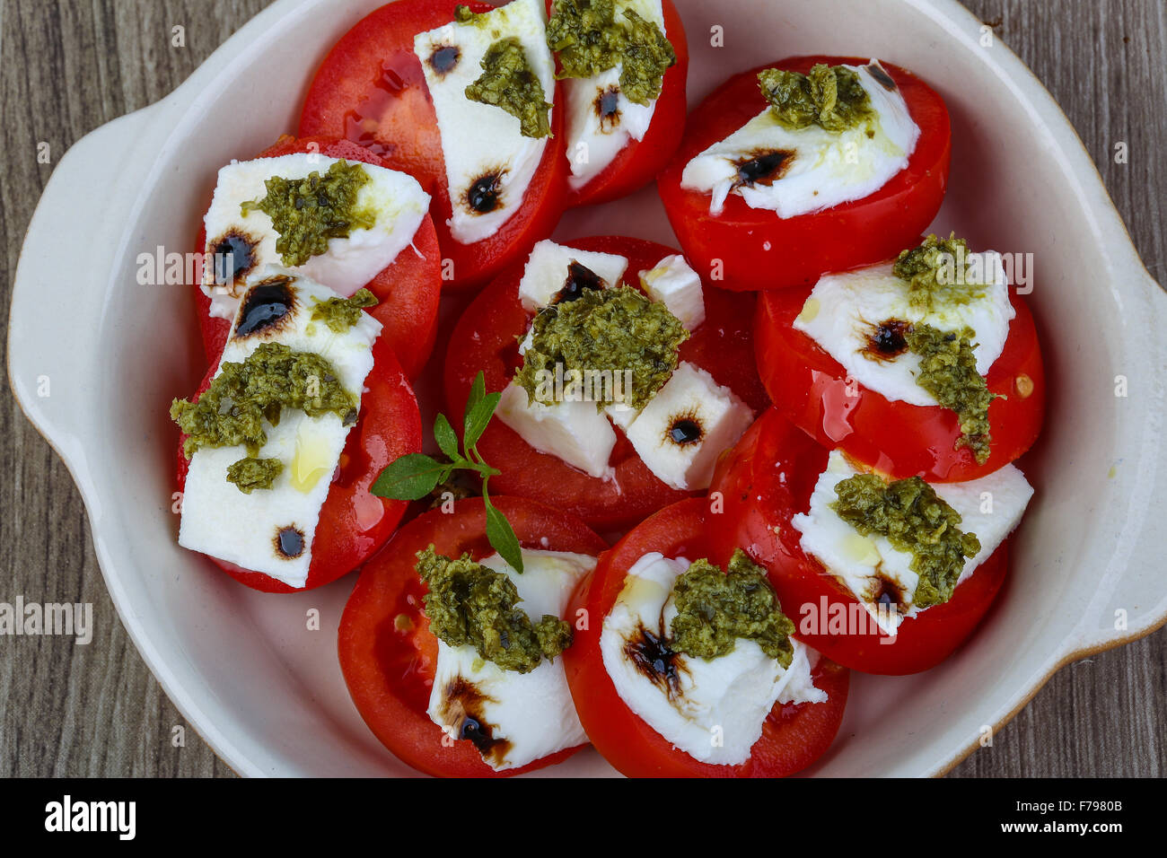 Traditional Italian Caprese salad on the wood background Stock Photo ...