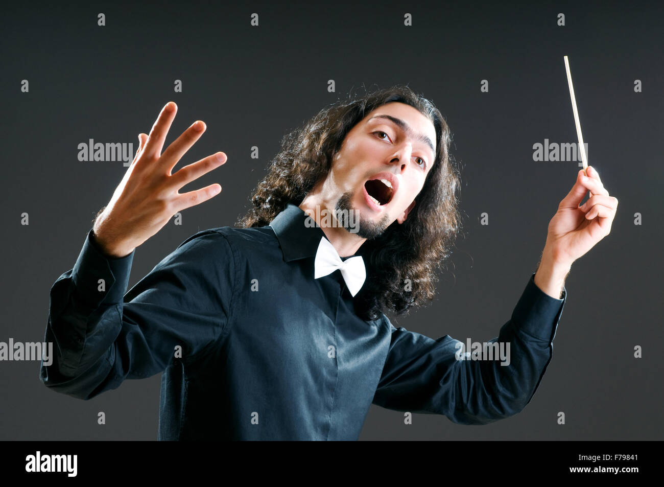 Music concept with passionate conductor Stock Photo - Alamy