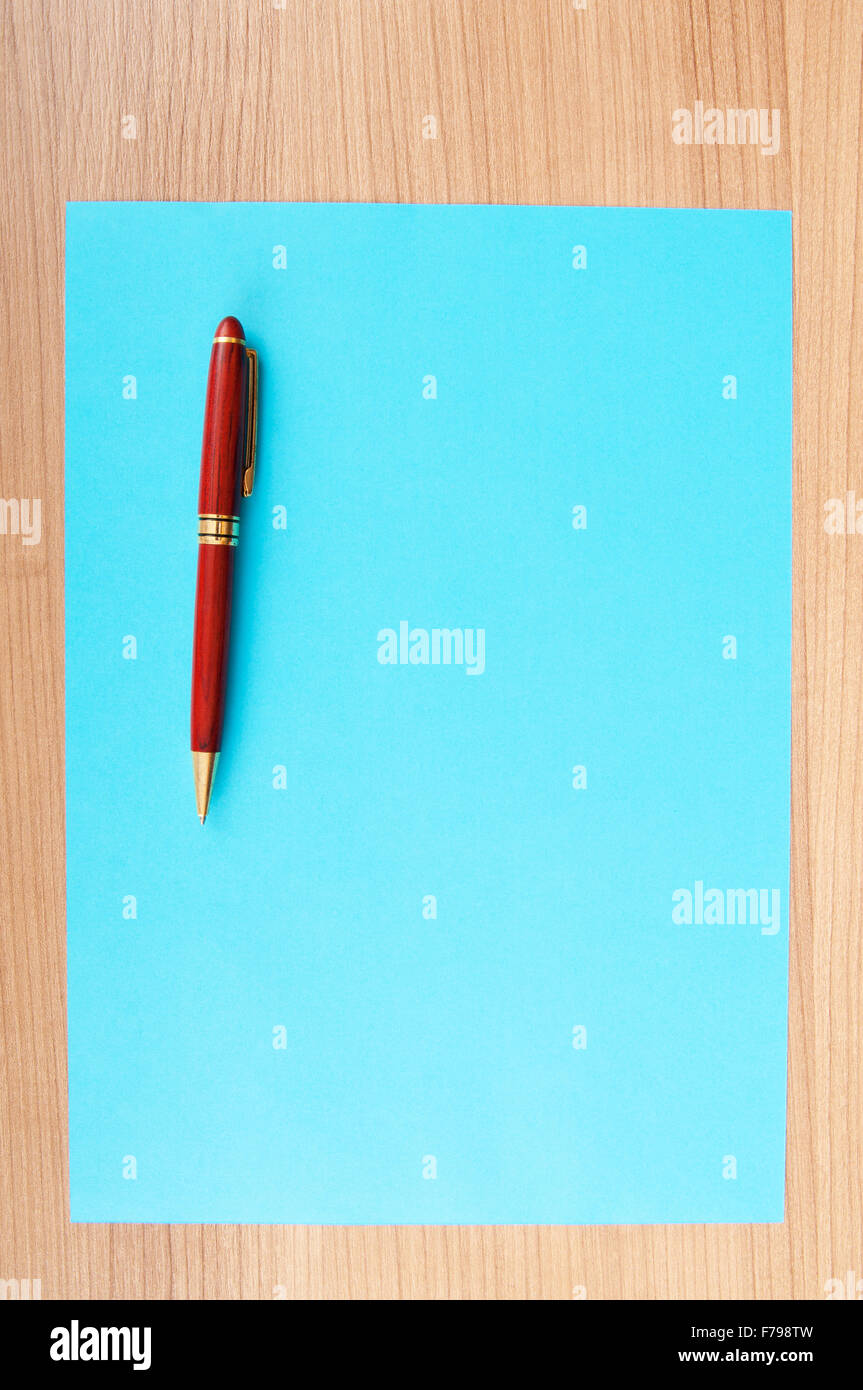 Paper background with pen Stock Photo - Alamy