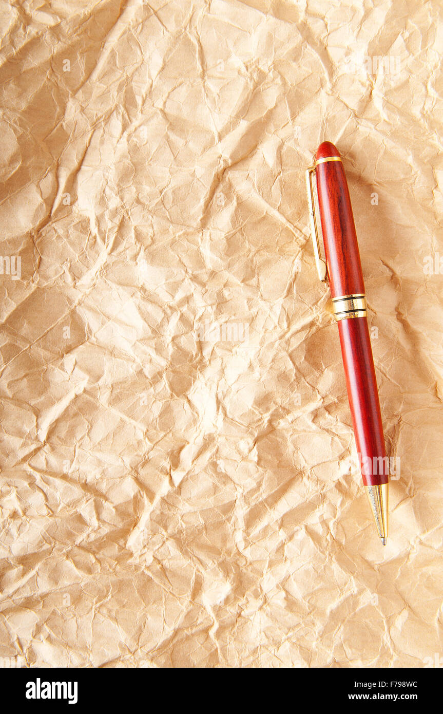 Paper background with pen Stock Photo - Alamy