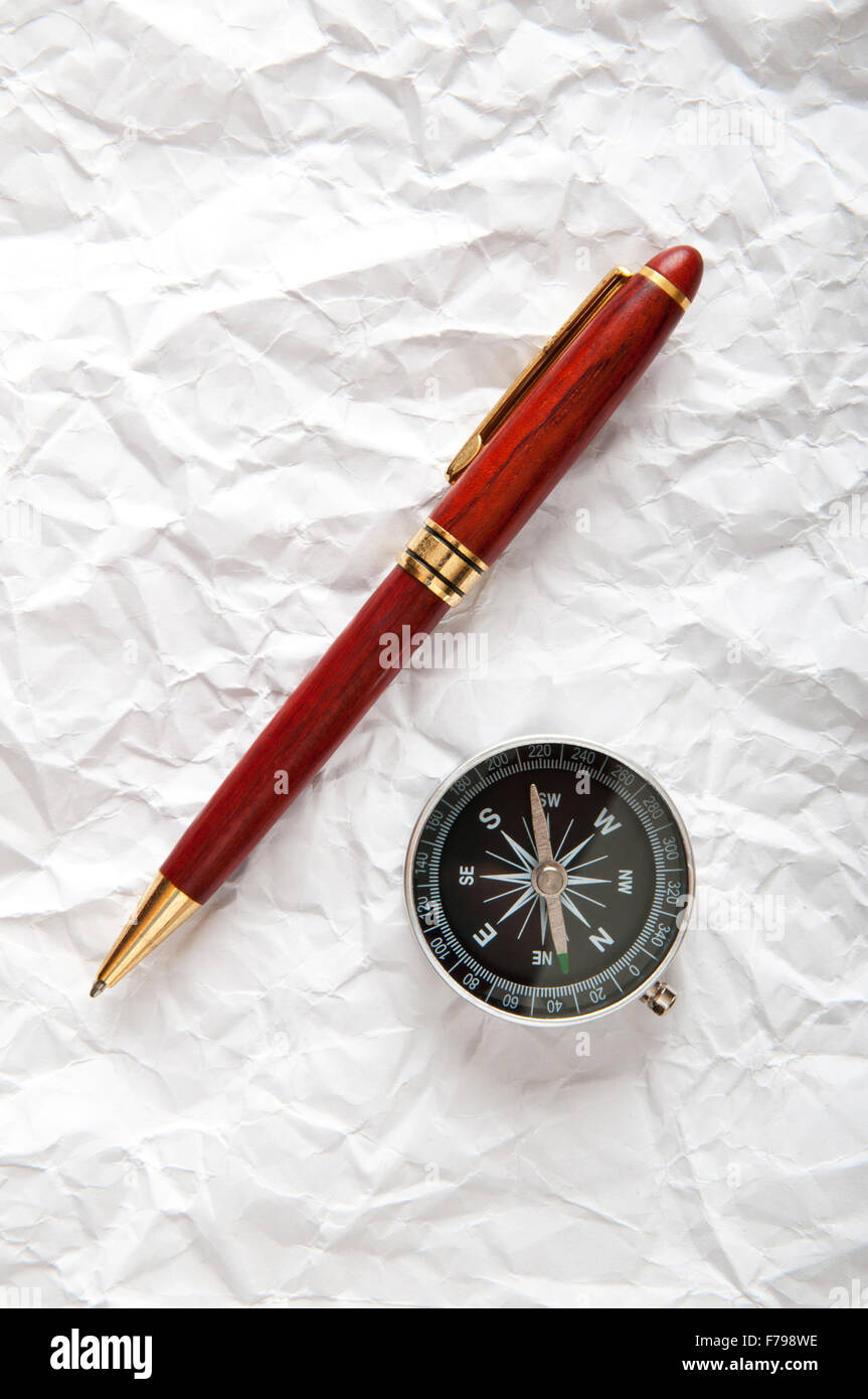 Vintage compass on the paper in adventure concept Stock Photo - Alamy