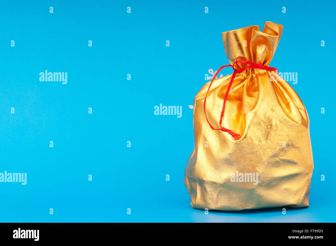 Golden sacks full of something good Stock Photo - Alamy