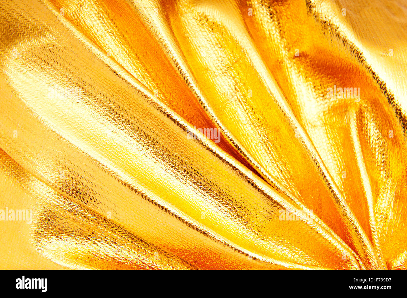 Shiny surface of gold photo reflector Stock Photo - Alamy