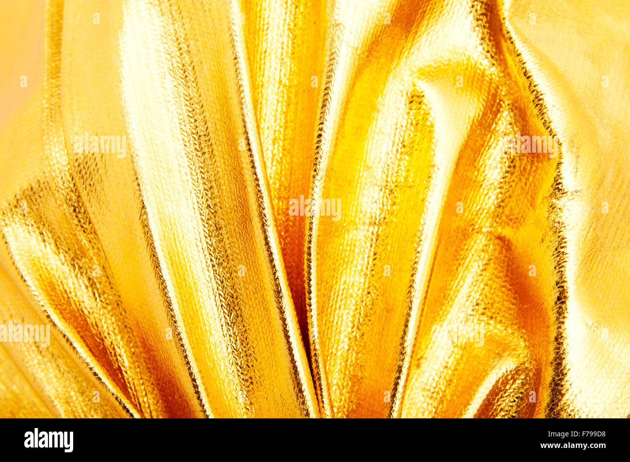 Shiny surface of gold photo reflector Stock Photo - Alamy