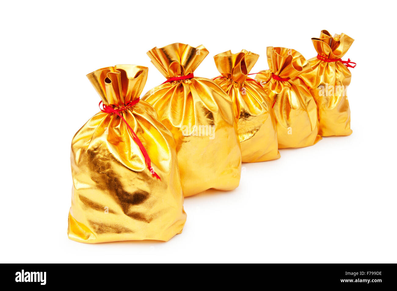 Golden sacks full of something good Stock Photo - Alamy