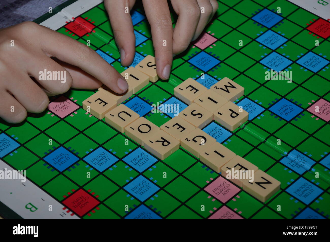 Hand scrabble game hi-res stock photography and images - Alamy