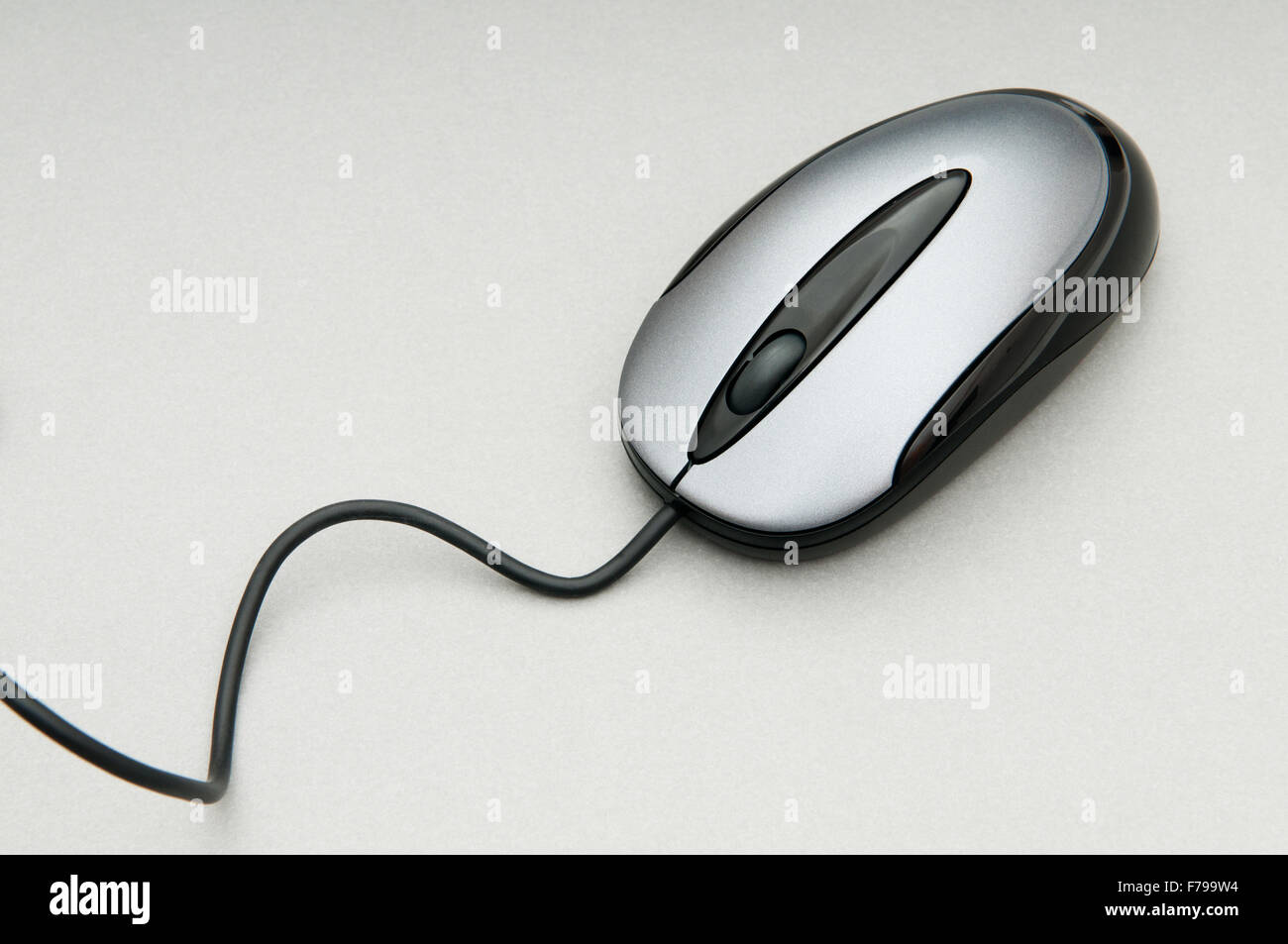 Computer mouse on the background - Technology concept Stock Photo - Alamy