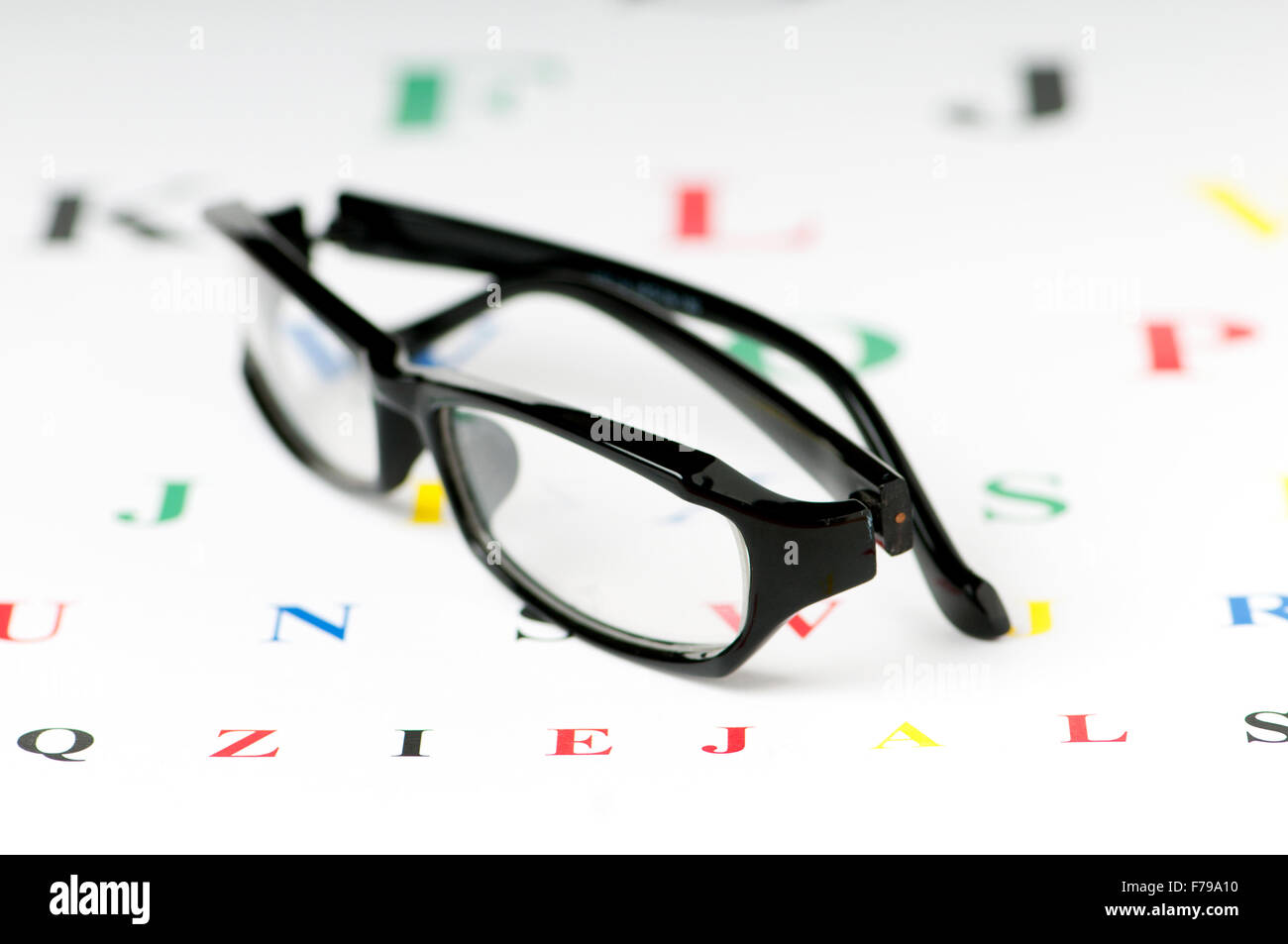 Optical reading glasses on the eyesight table Stock Photo - Alamy