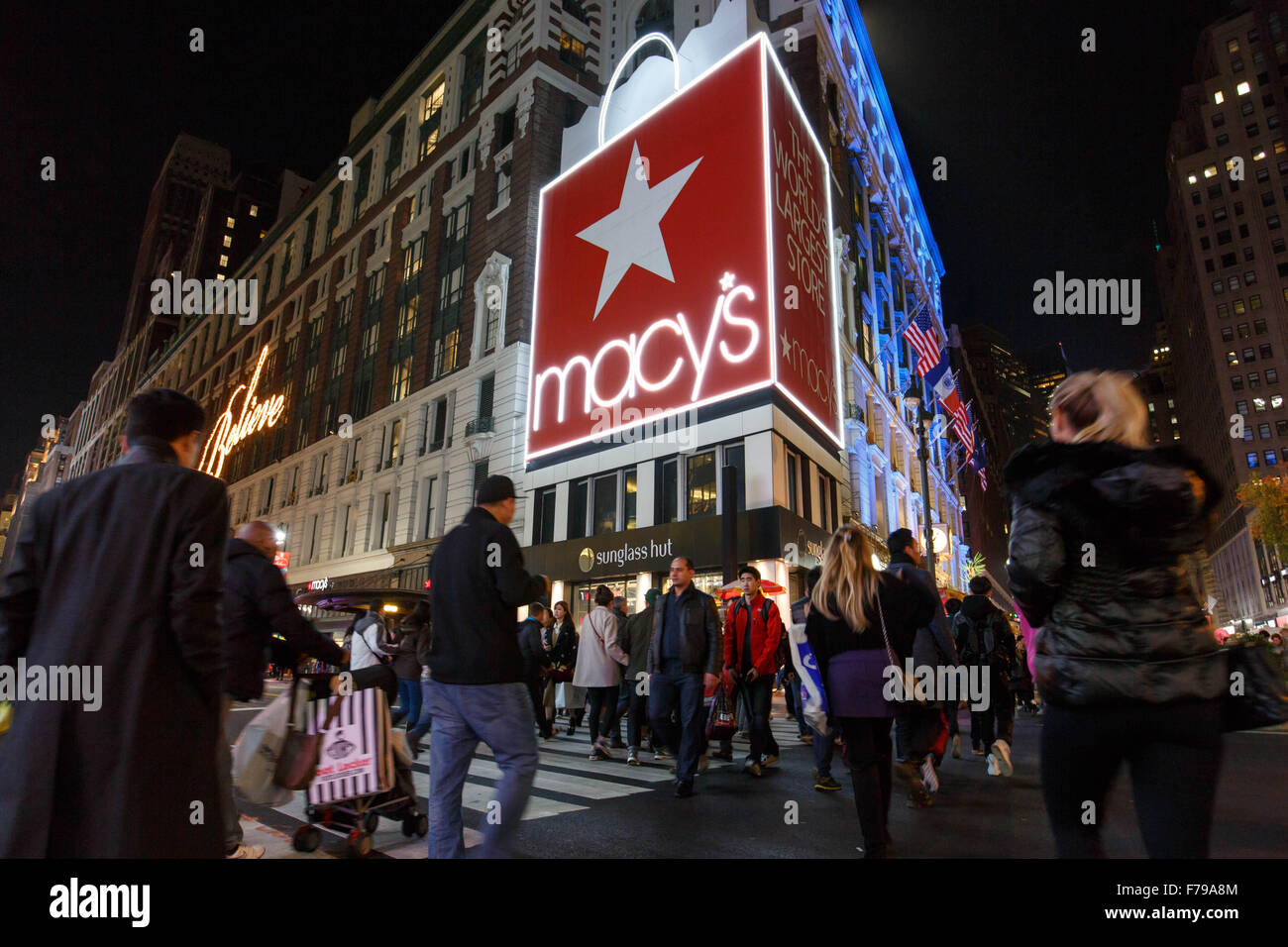 Black friday shoppers walk hi-res stock photography and images - Alamy