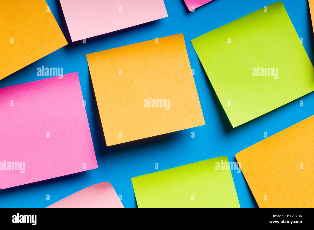 Reminder notes on the bright colorful paper Stock Photo - Alamy