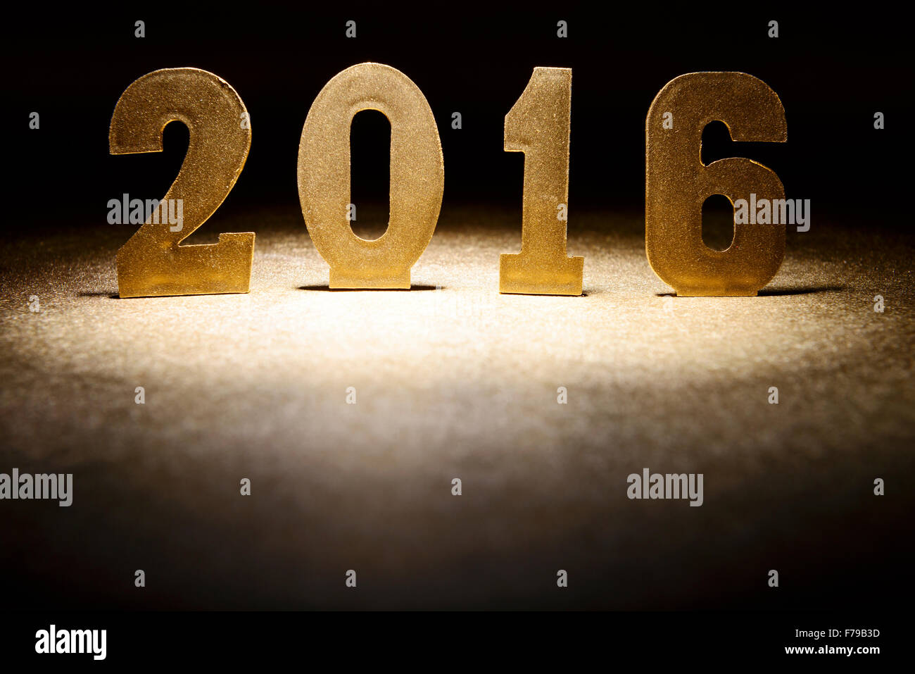 golden figures 2016 on a gold background Stock Photo - Alamy
