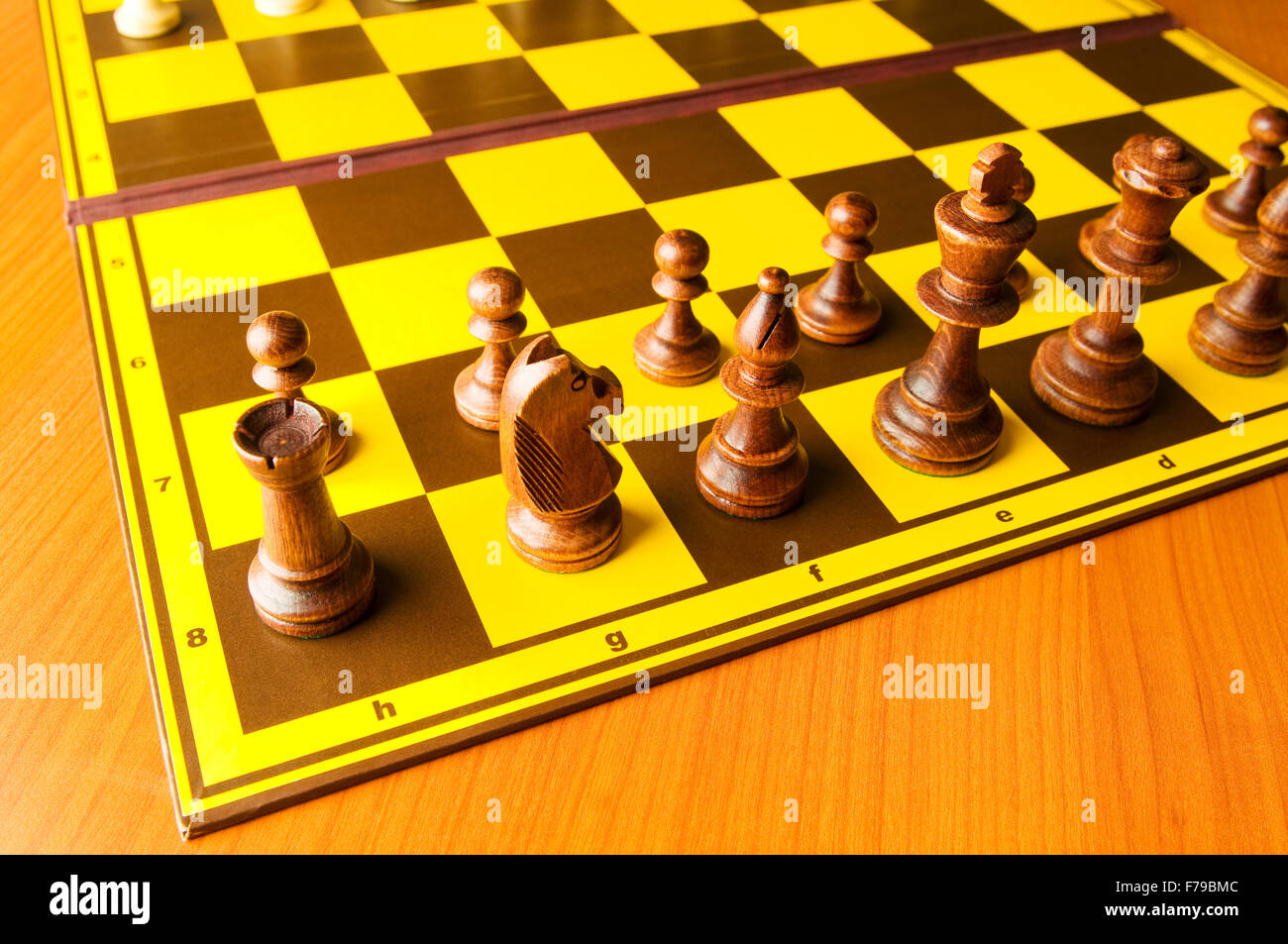 Set of chess figures on the playing board Stock Photo - Alamy