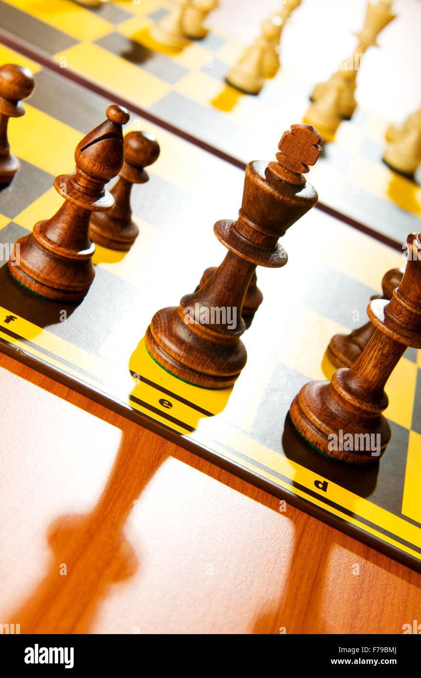 Set of chess figures on the playing board Stock Photo - Alamy