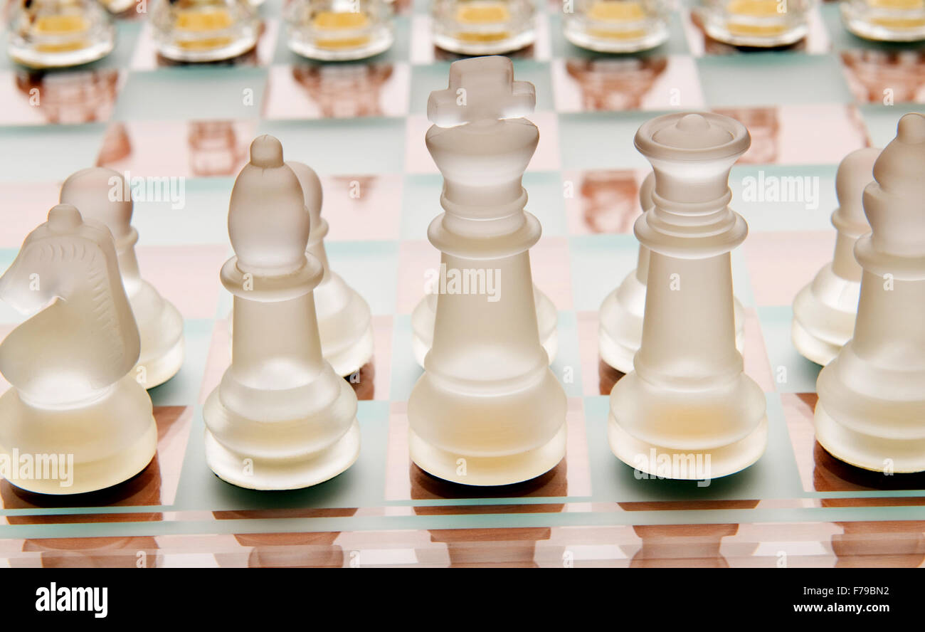 Set of chess figures on the playing board Stock Photo - Alamy