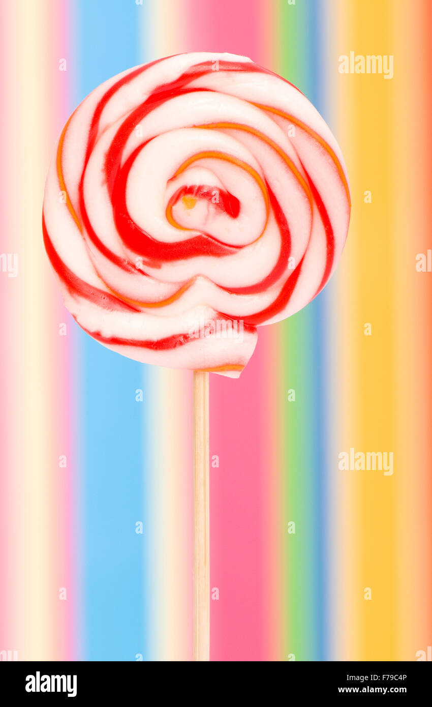 Colourful lollipop against the colourful background Stock Photo - Alamy