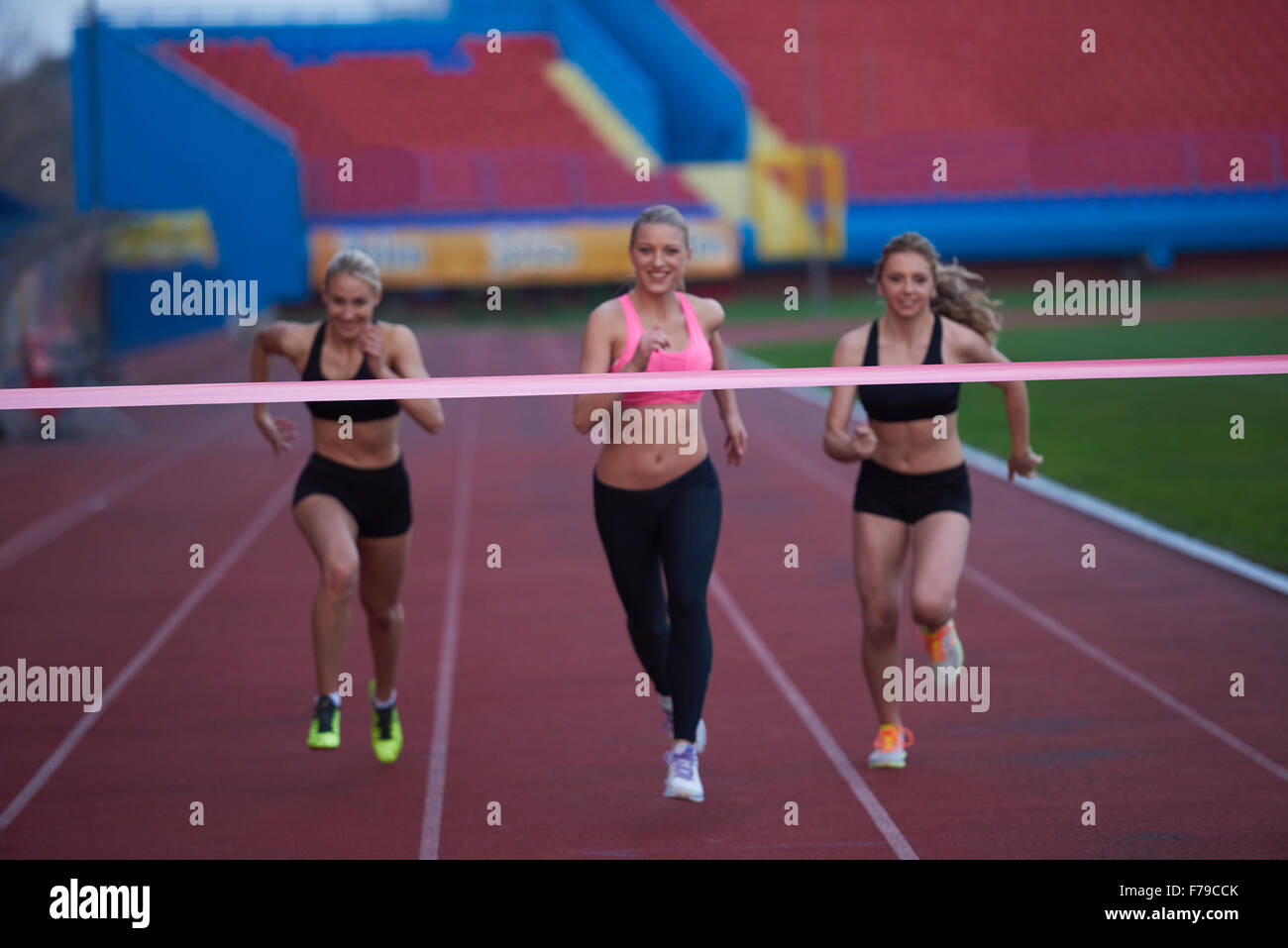 Portrait of three female runners hi-res stock photography and images ...