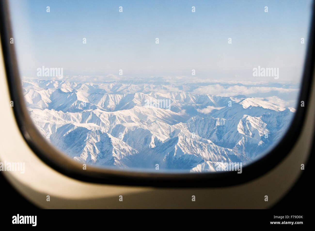 Winter mountains from the plane window Stock Photo - Alamy