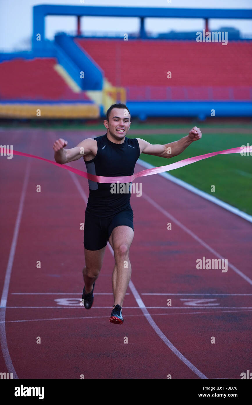 athletic runner finis line track Stock Photo - Alamy