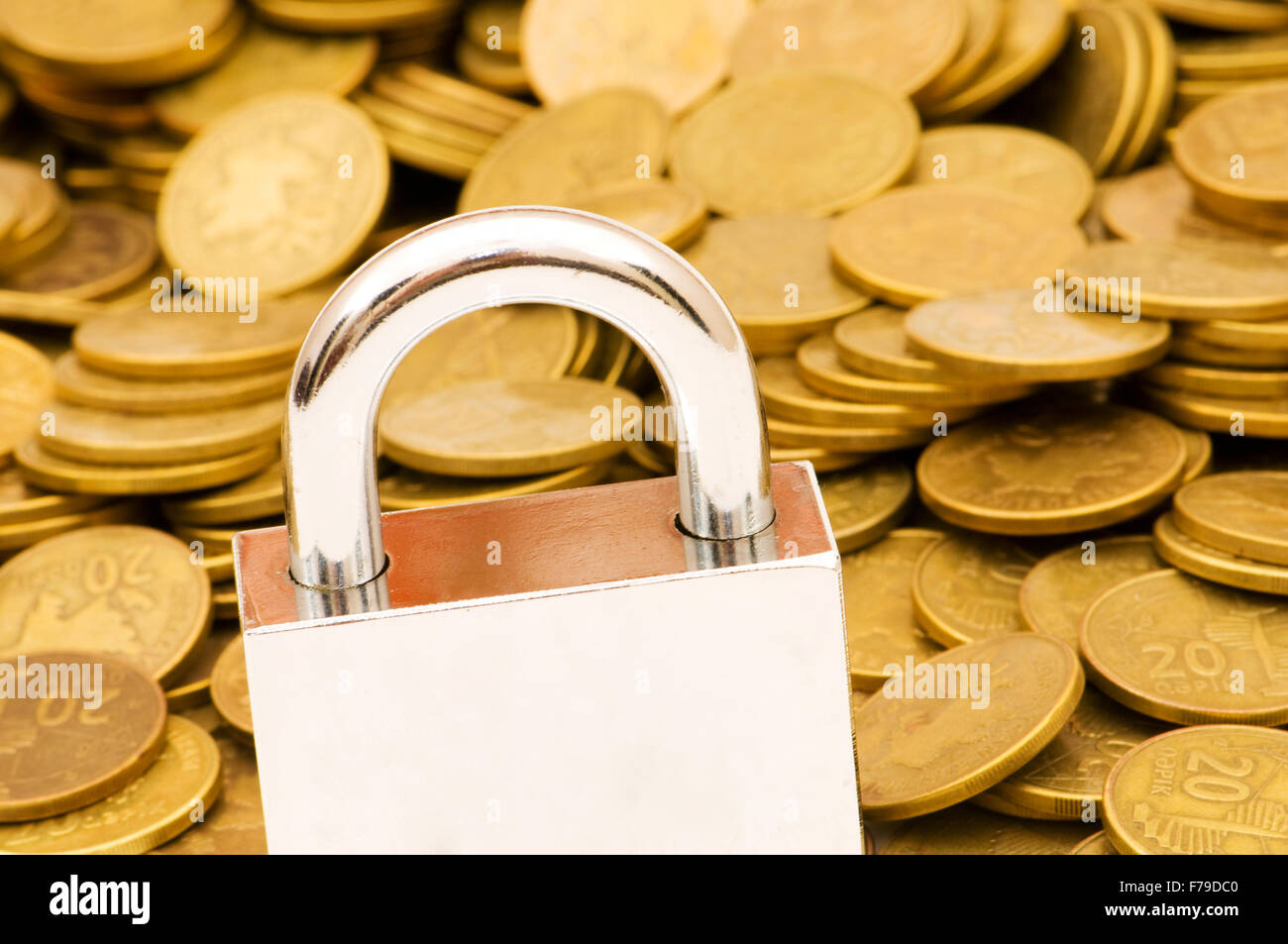 Concept of financial security with lock and coins Stock Photo - Alamy