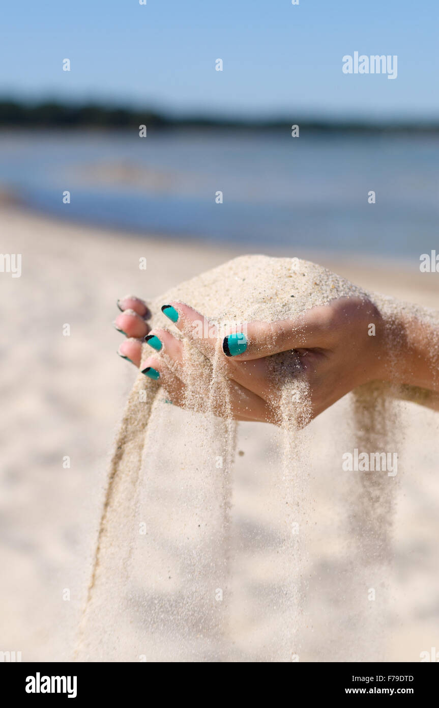 Sand Falling Through Hands High Resolution Stock Photography and Images ...