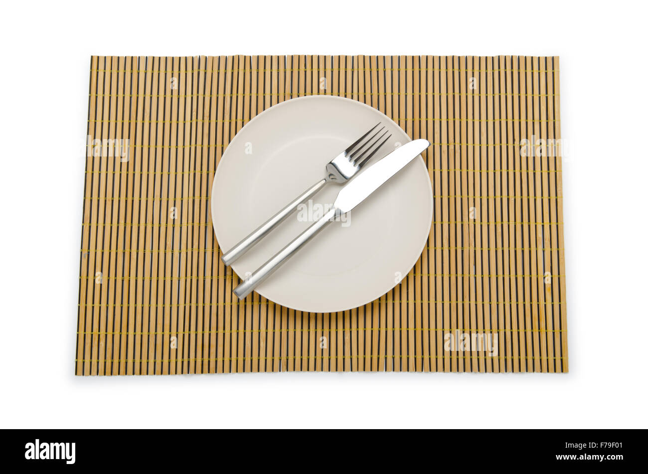 Plate and utensils served on table Stock Photo - Alamy
